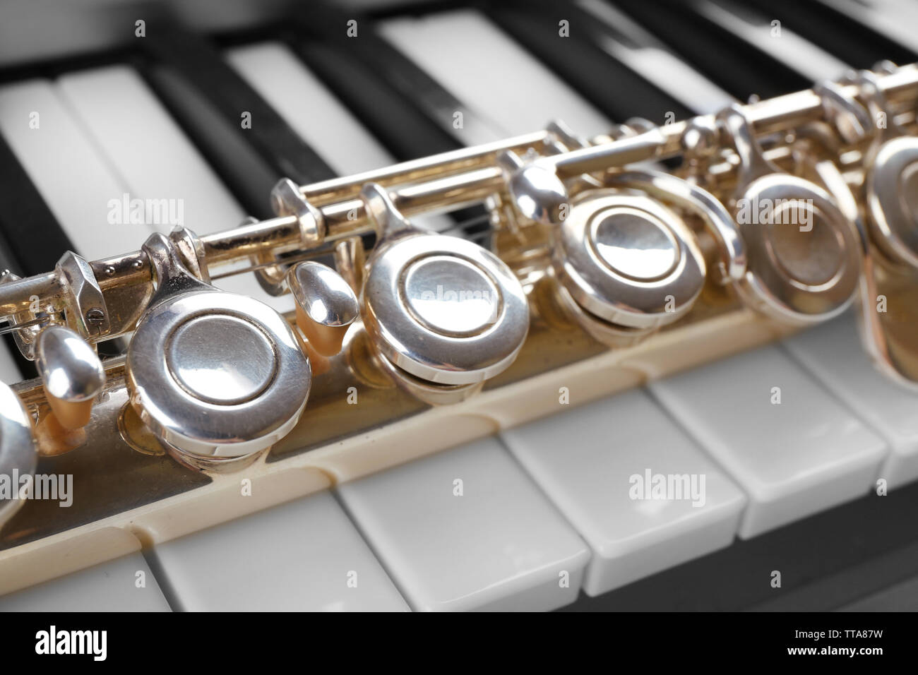 Flute and piano close up Stock Photo - Alamy