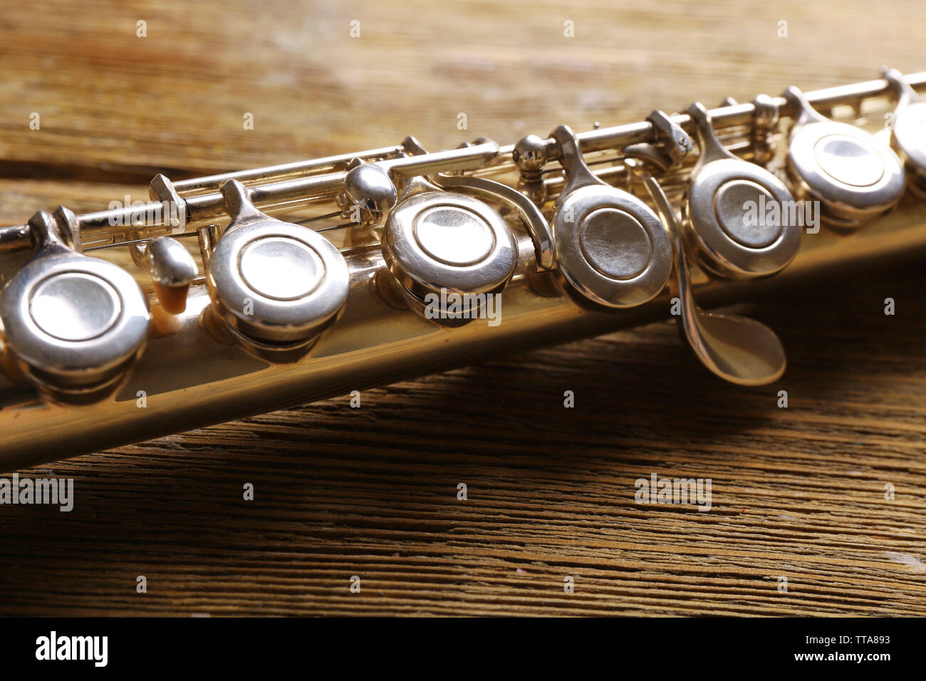 Flute on wooden background Stock Photo - Alamy