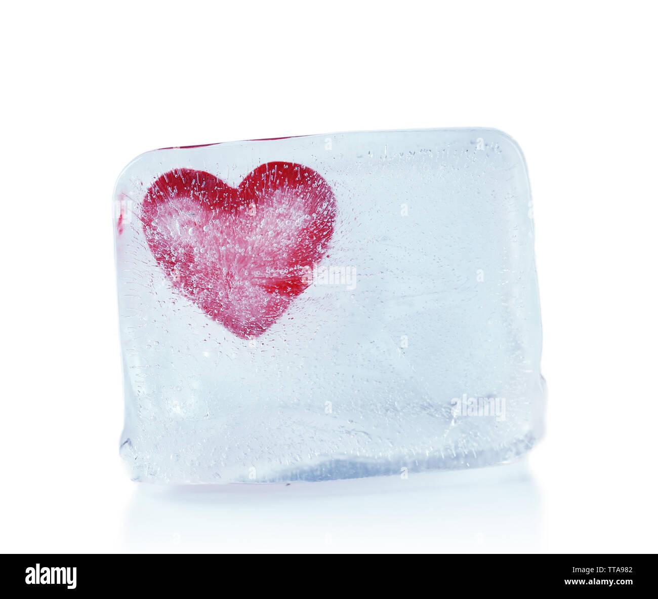 Red heart in ice cube on gray background Stock Photo - Alamy
