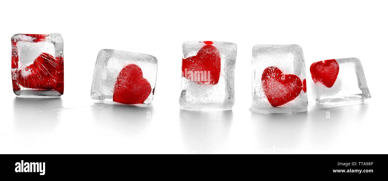 Red hearts in ice cubes isolated on white Stock Photo - Alamy