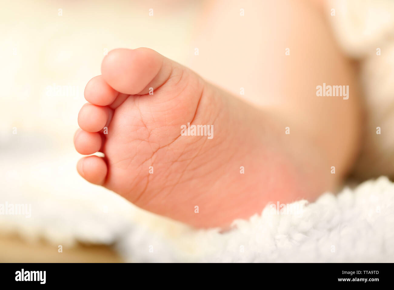 Baby foot, closeup Stock Photo - Alamy