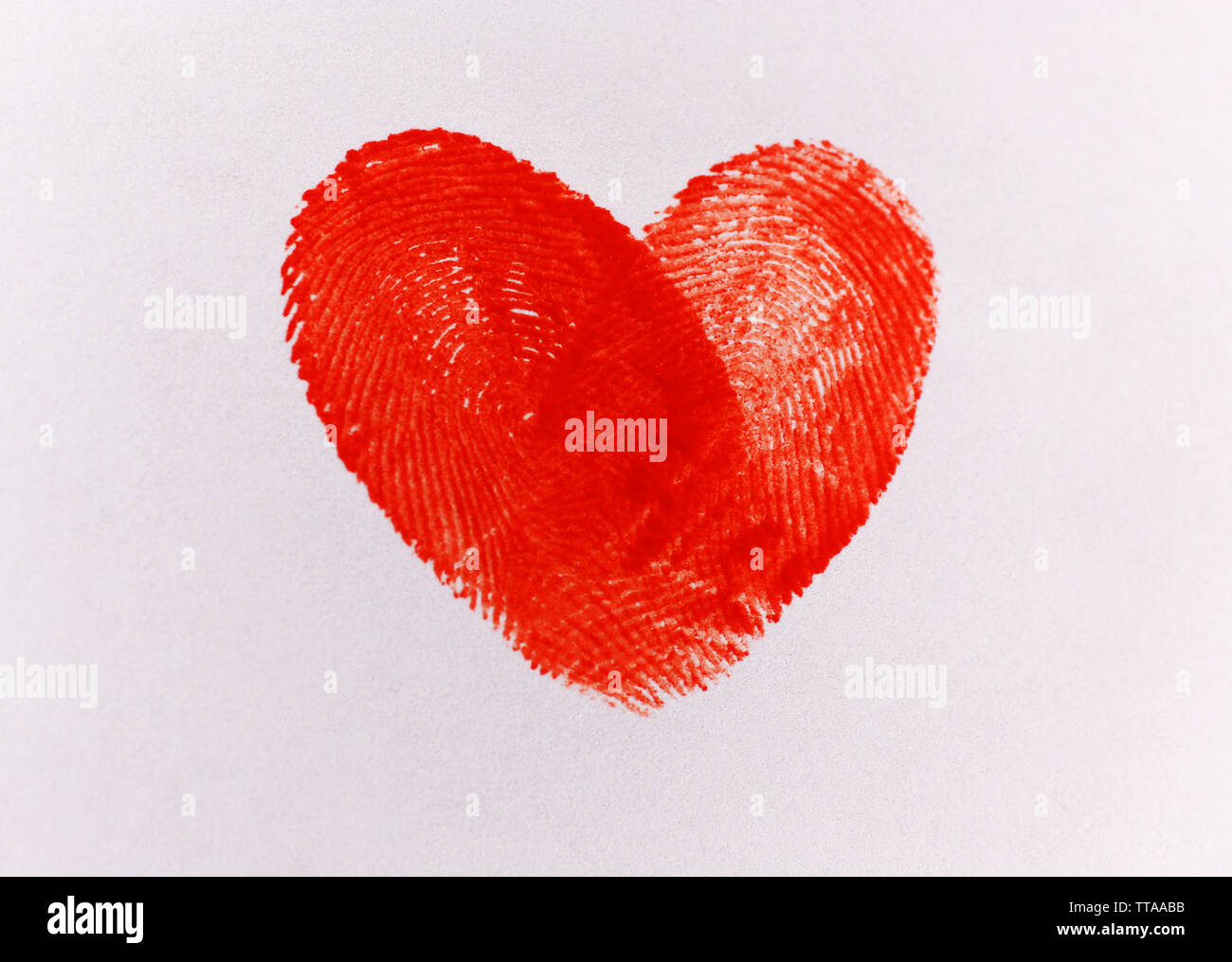 Heart of fingerprints on white paper background Stock Photo - Alamy
