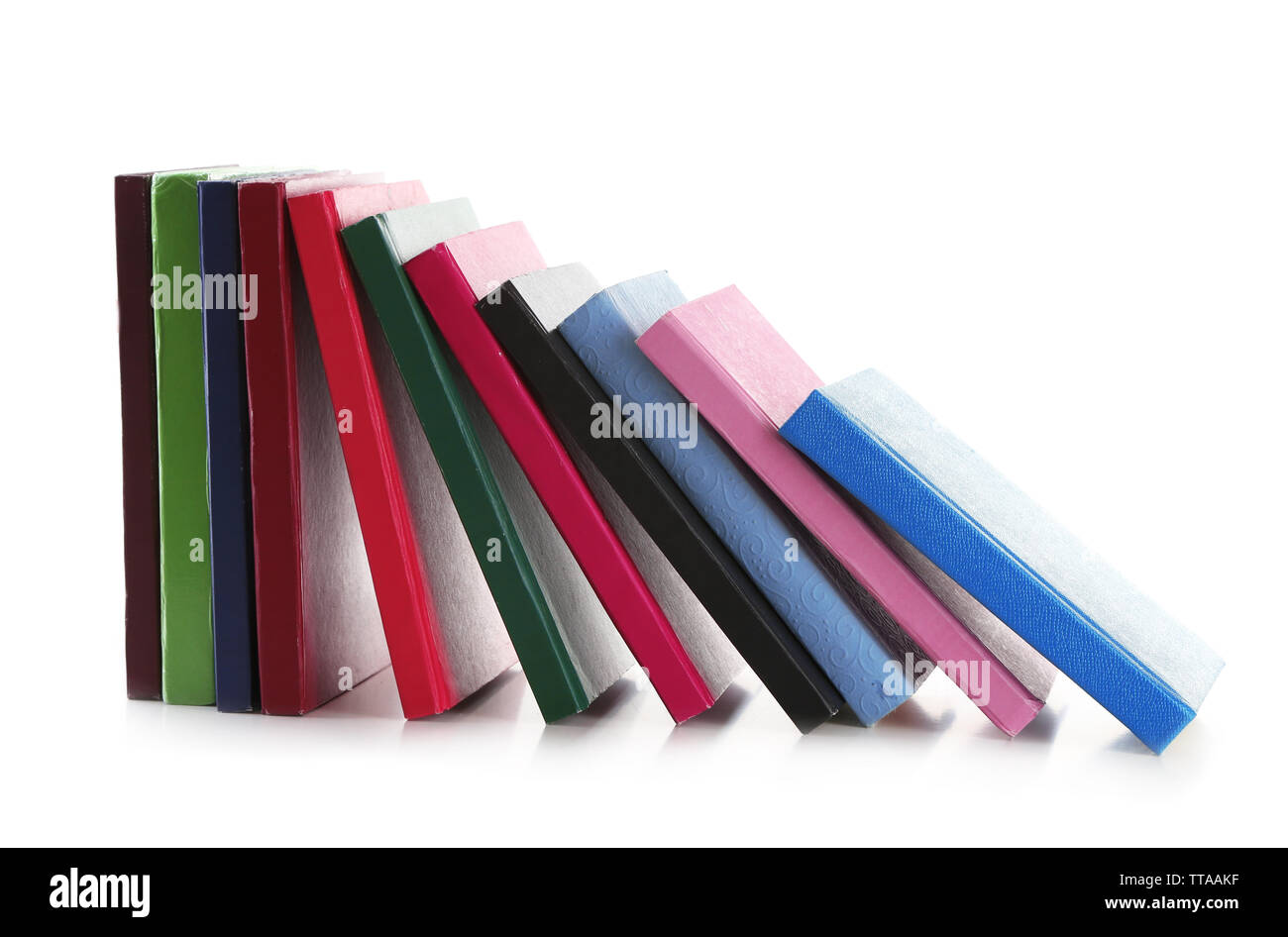 Falling books isolated on white Stock Photo - Alamy