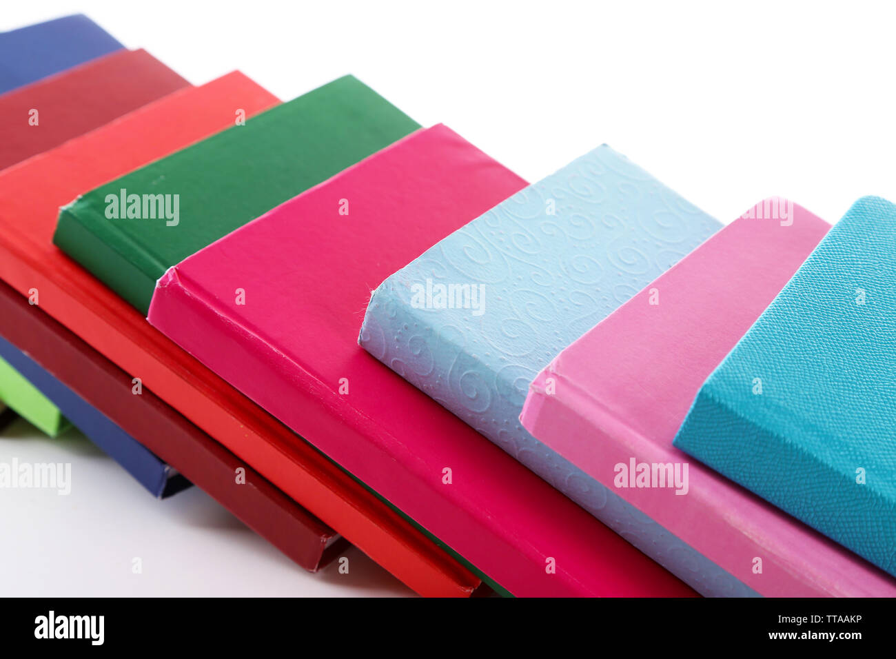 Falling books isolated on white Stock Photo - Alamy