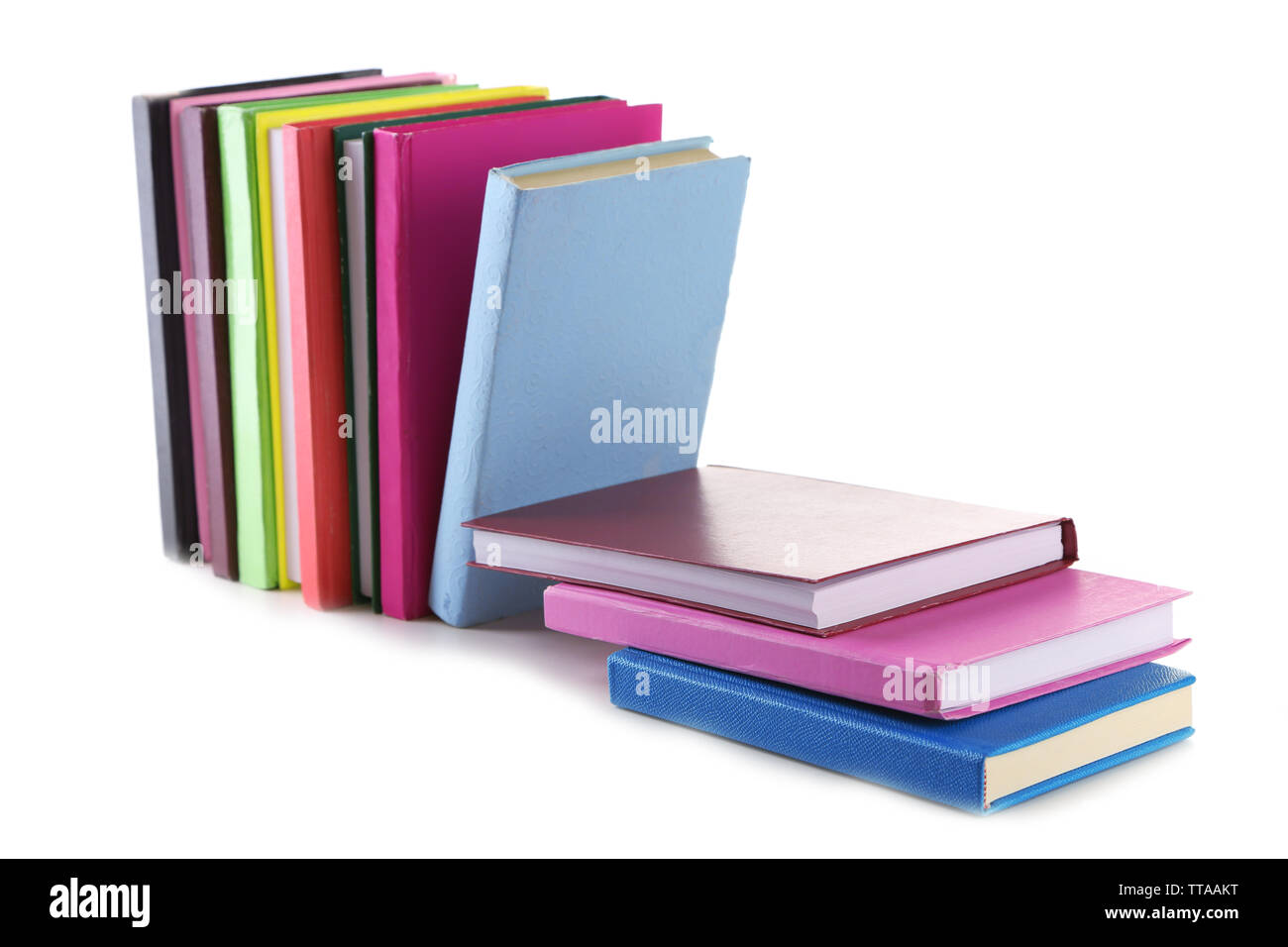 Falling books isolated on white Stock Photo - Alamy