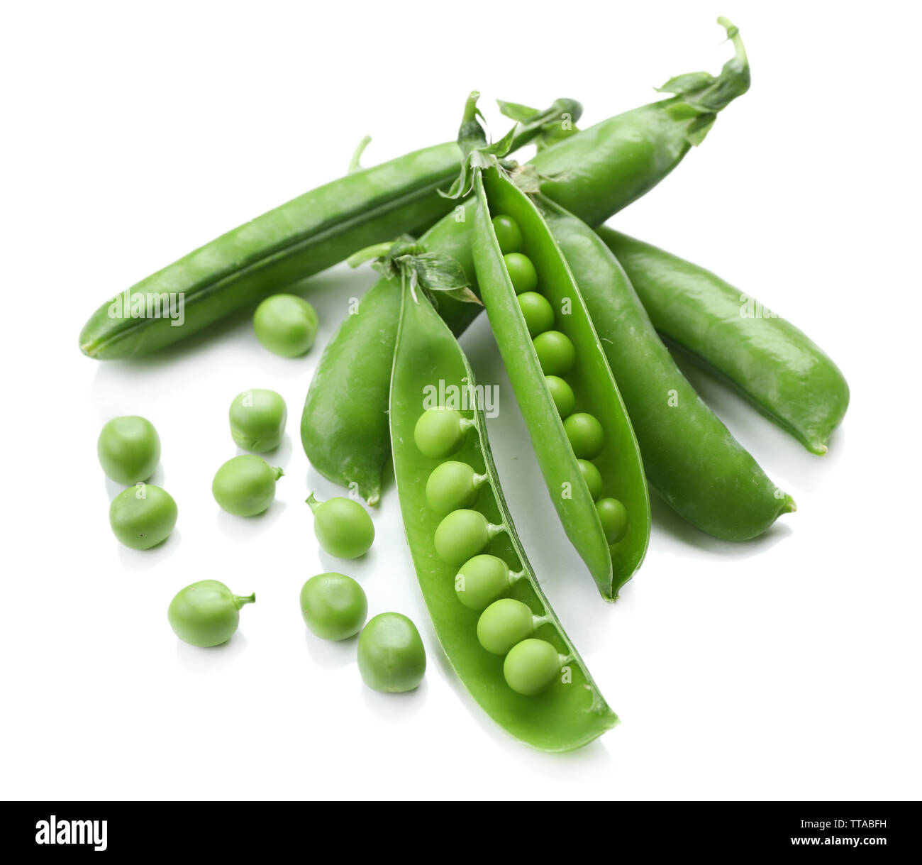 Fresh green peas isolated on white Stock Photo - Alamy