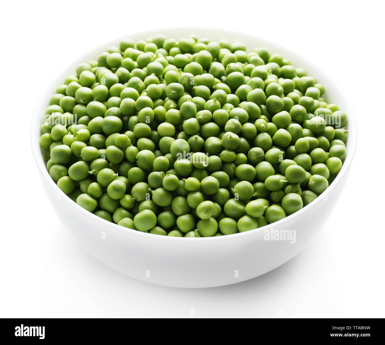 Fresh green peas in bowl isolated on white Stock Photo - Alamy