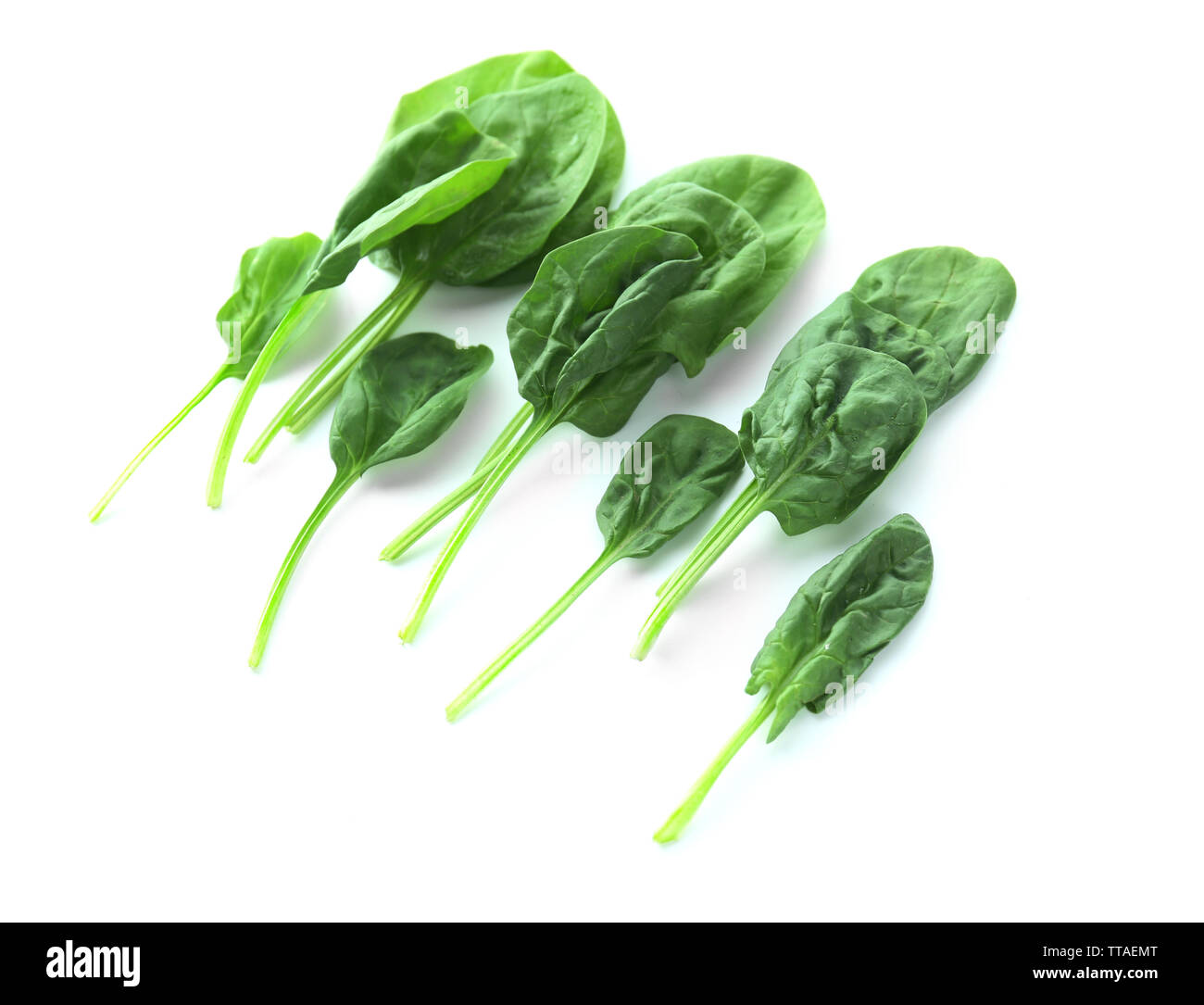 Fresh spinach leaves isolated on white Stock Photo - Alamy
