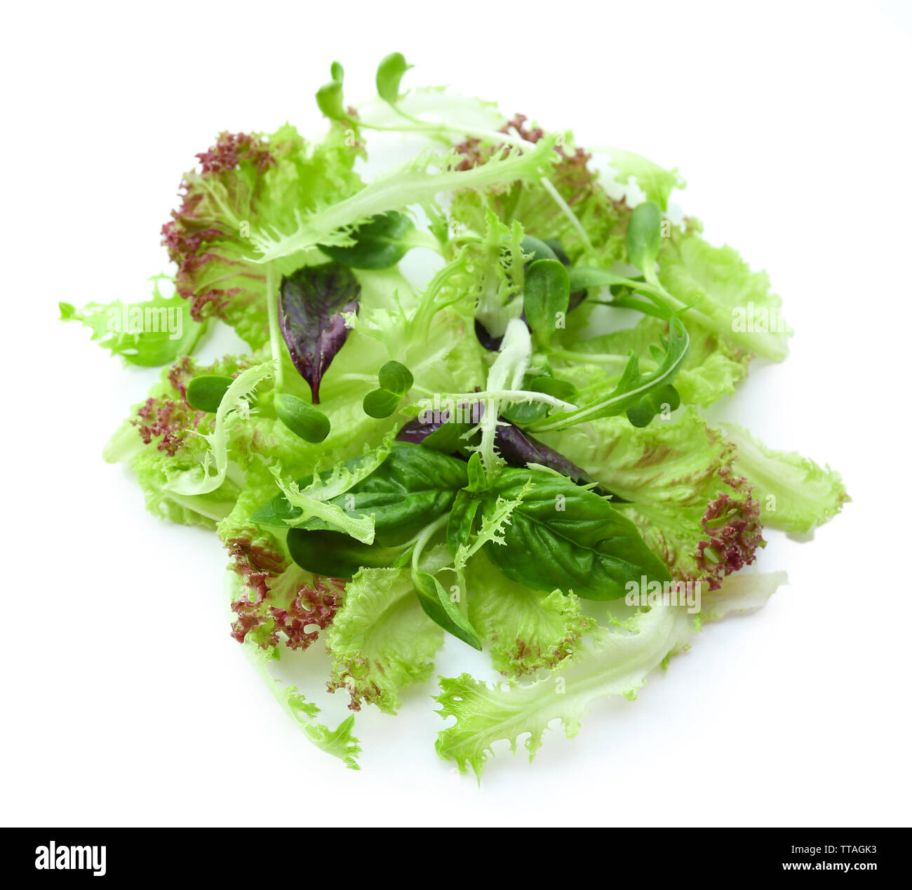Fresh mixed green salad isolated on white Stock Photo - Alamy