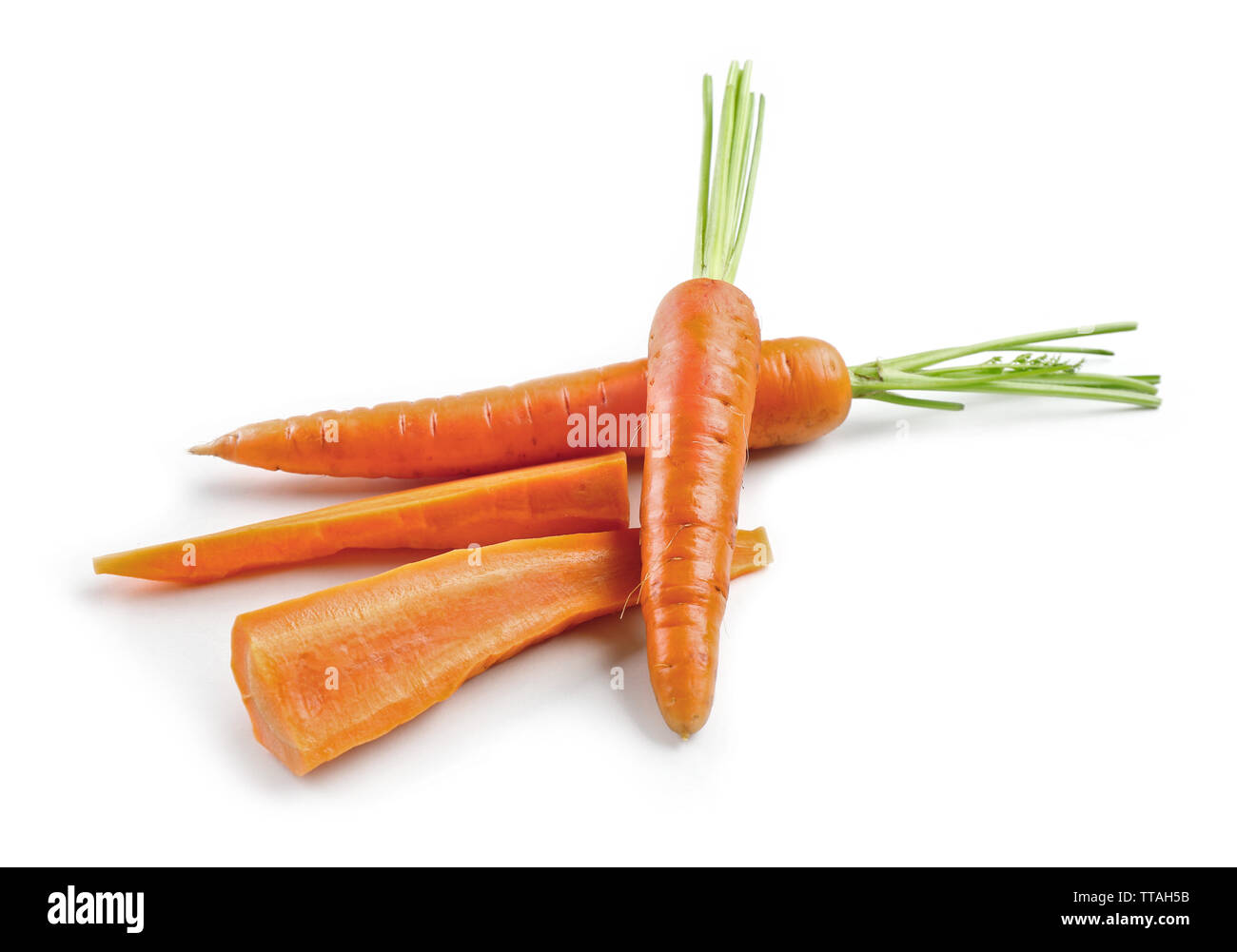 Sliced carrot isolated on white Stock Photo - Alamy