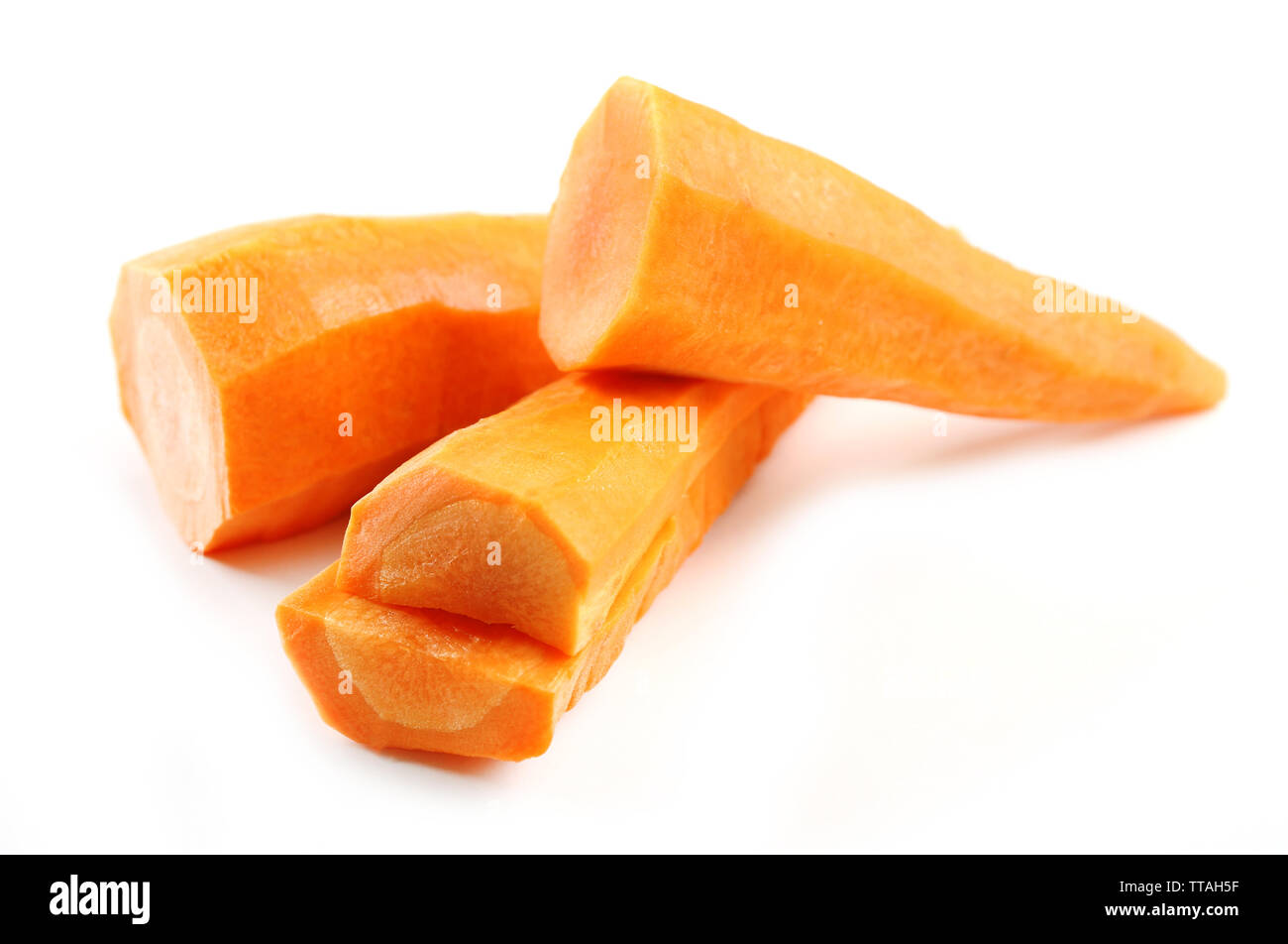 Peeled and sliced carrot isolated on white Stock Photo - Alamy