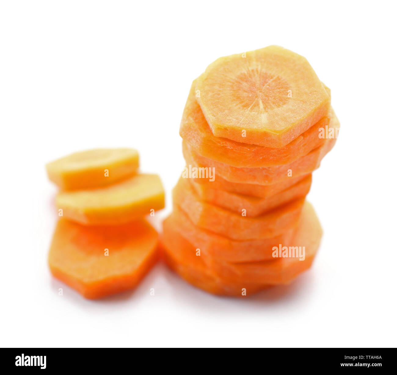 Sliced carrot isolated on white Stock Photo - Alamy