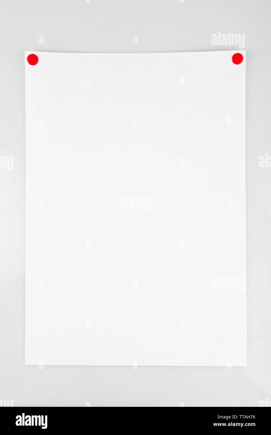 White sheet of paper attached on white background Stock Photo - Alamy