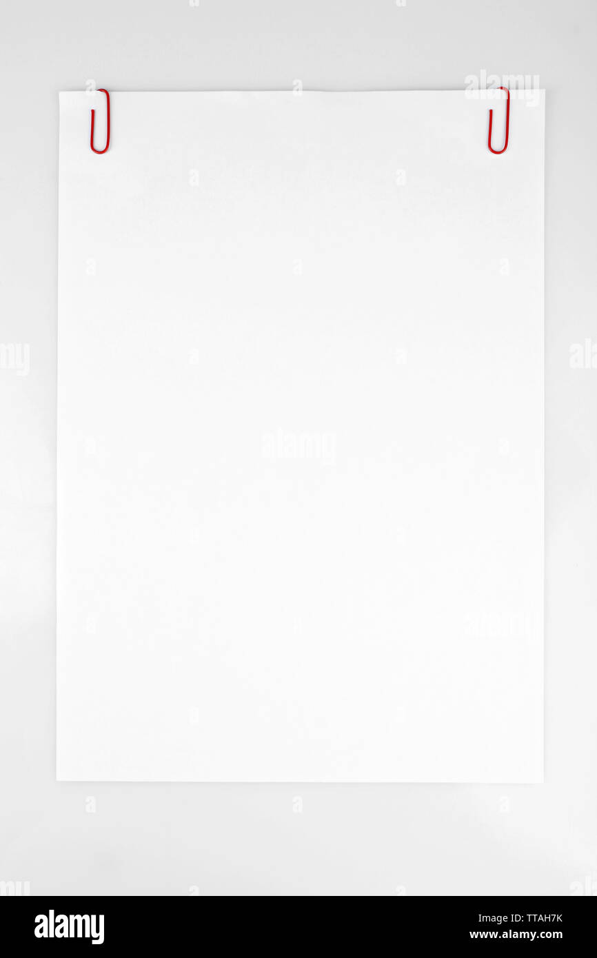 White sheet of paper attached on white background Stock Photo - Alamy