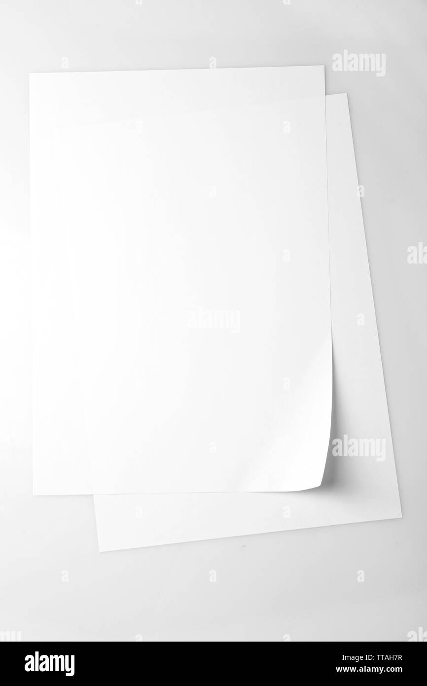 White sheets of paper on white background Stock Photo - Alamy