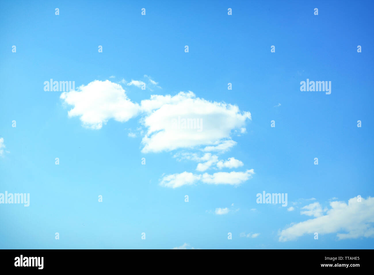 Clear blue sky with clouds Stock Photo - Alamy