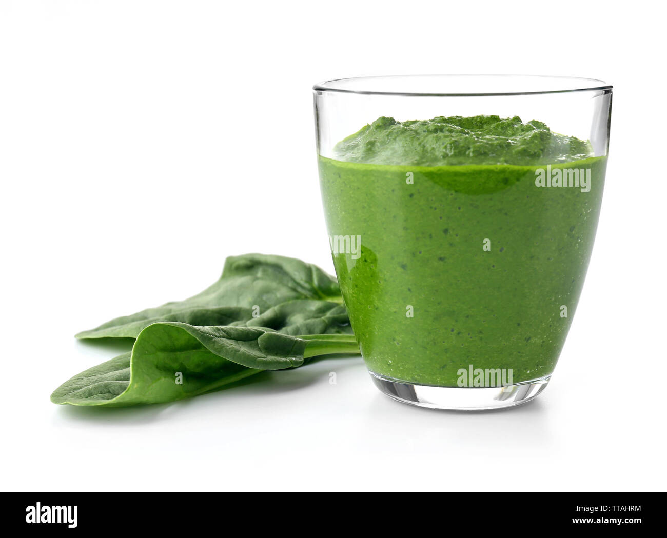 Glass of spinach juice isolated on white Stock Photo - Alamy