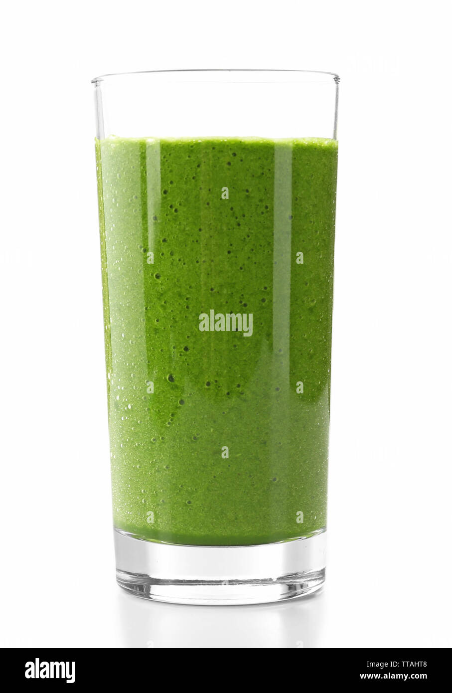 Glass of spinach juice isolated on white Stock Photo - Alamy