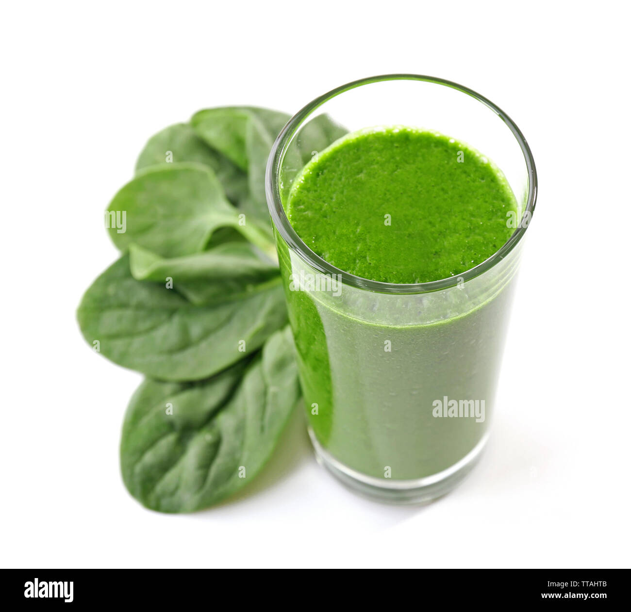Glass of spinach juice isolated on white Stock Photo - Alamy