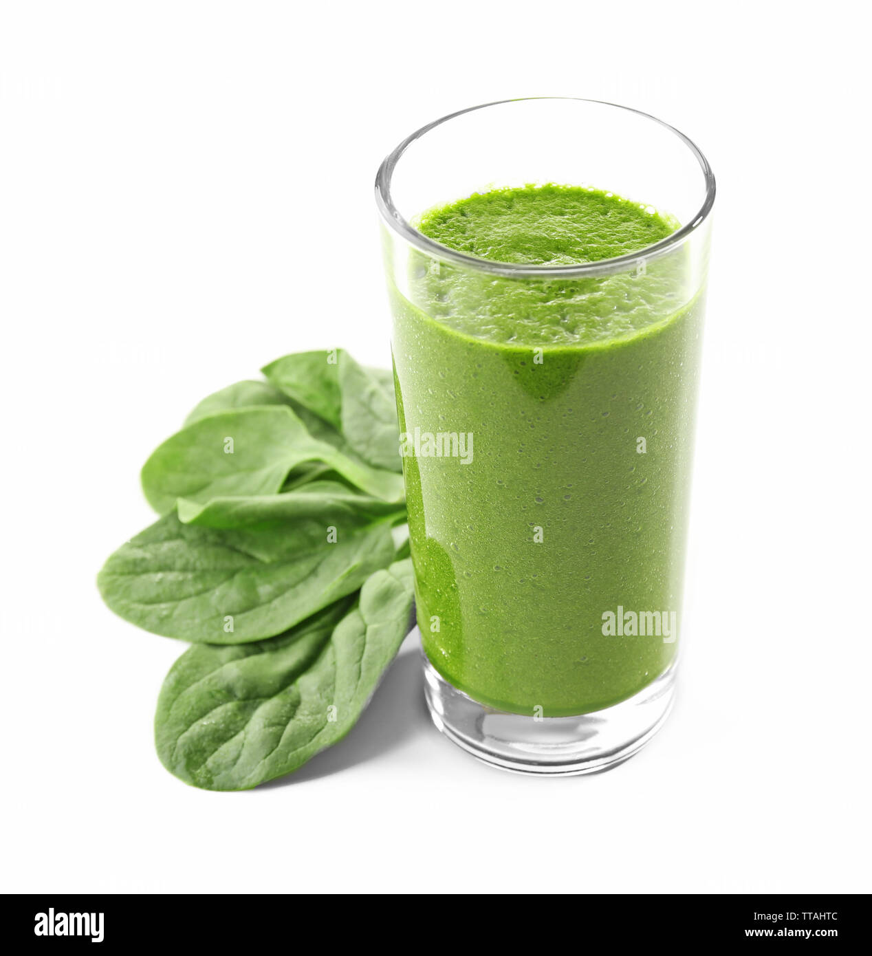 Glass of spinach juice isolated on white Stock Photo - Alamy