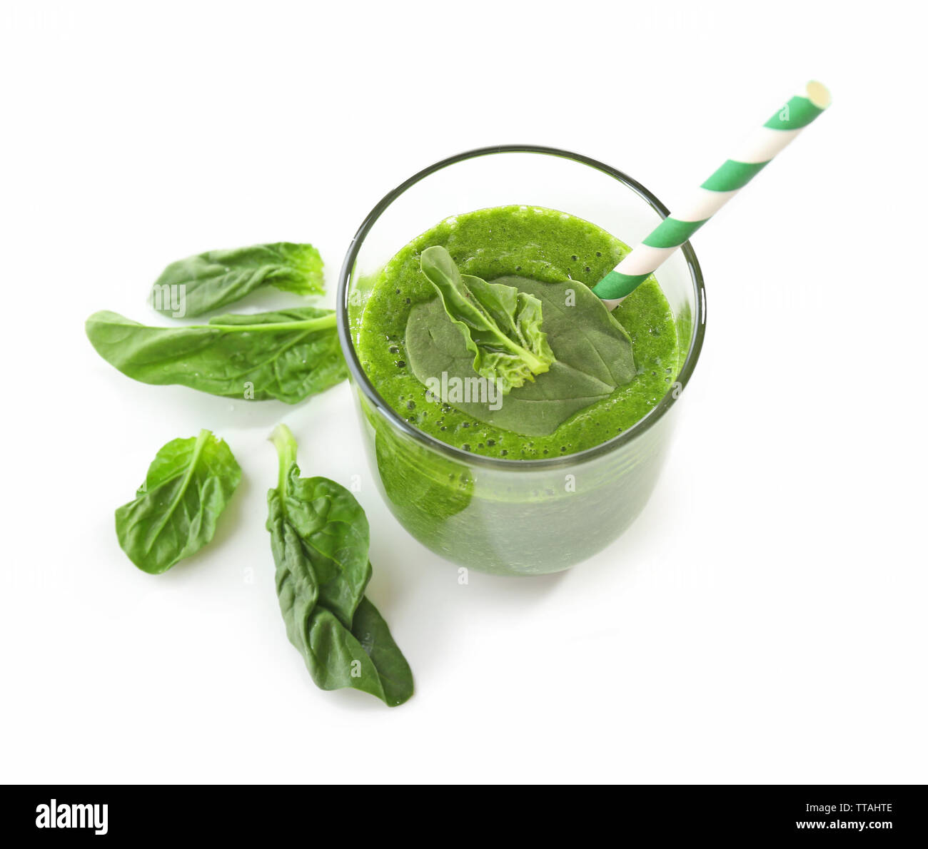 Glass of spinach juice isolated on white Stock Photo - Alamy