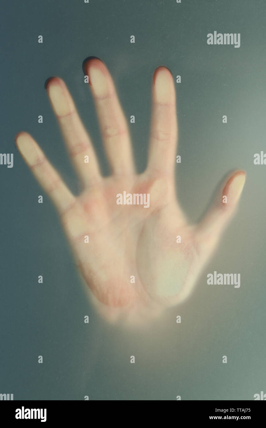 Female hand behind wet hi-res stock photography and images - Alamy
