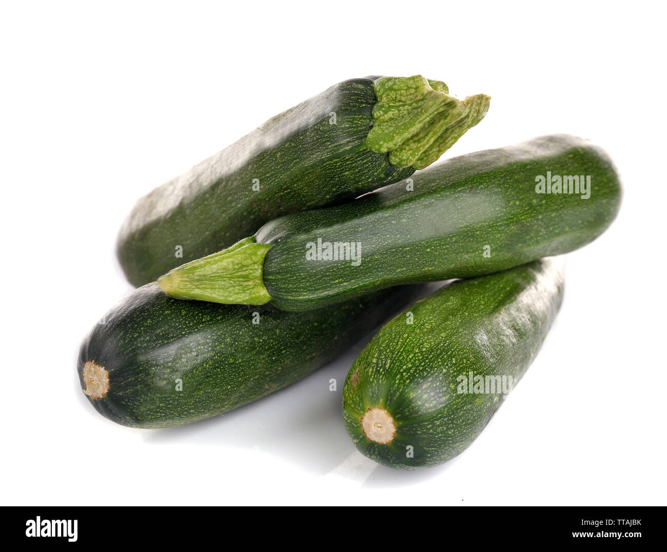 Fresh zucchini isolated on white Stock Photo - Alamy