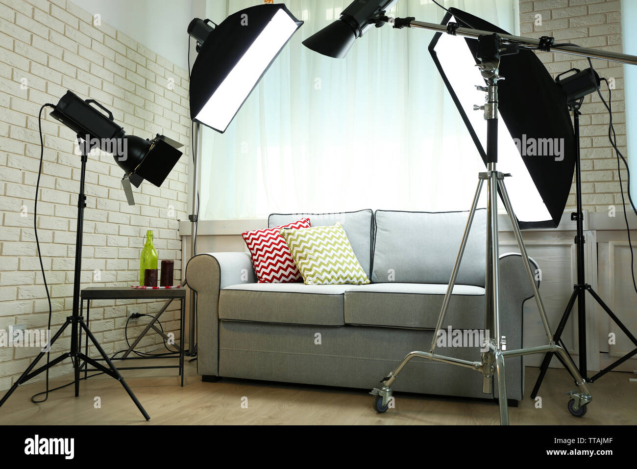 Photo studio with modern interior and lighting equipment Stock Photo ...