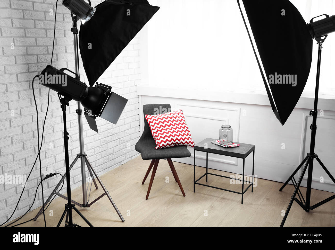 Photo studio with modern interior and lighting equipment Stock Photo ...