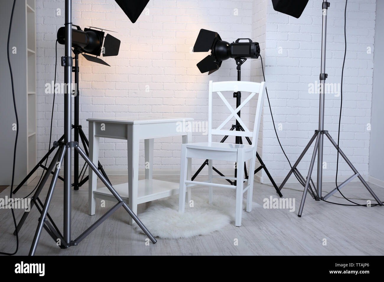 Photo studio with modern interior and lighting equipment Stock Photo ...