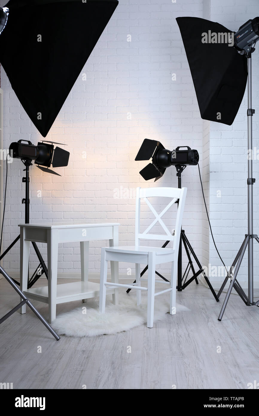 Photo studio with modern interior and lighting equipment Stock Photo ...