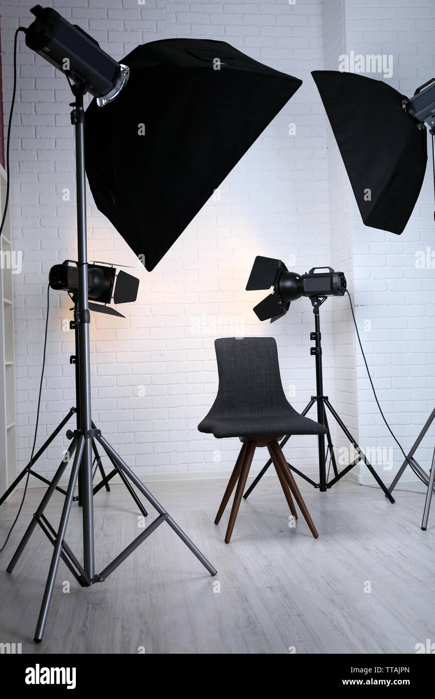 Photo studio with modern interior and lighting equipment Stock Photo ...