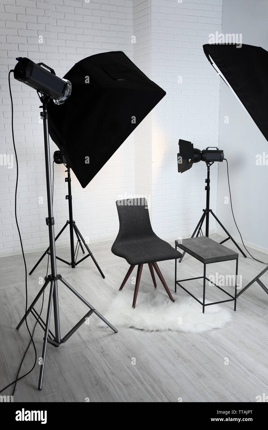 Photo studio with modern interior and lighting equipment Stock Photo ...