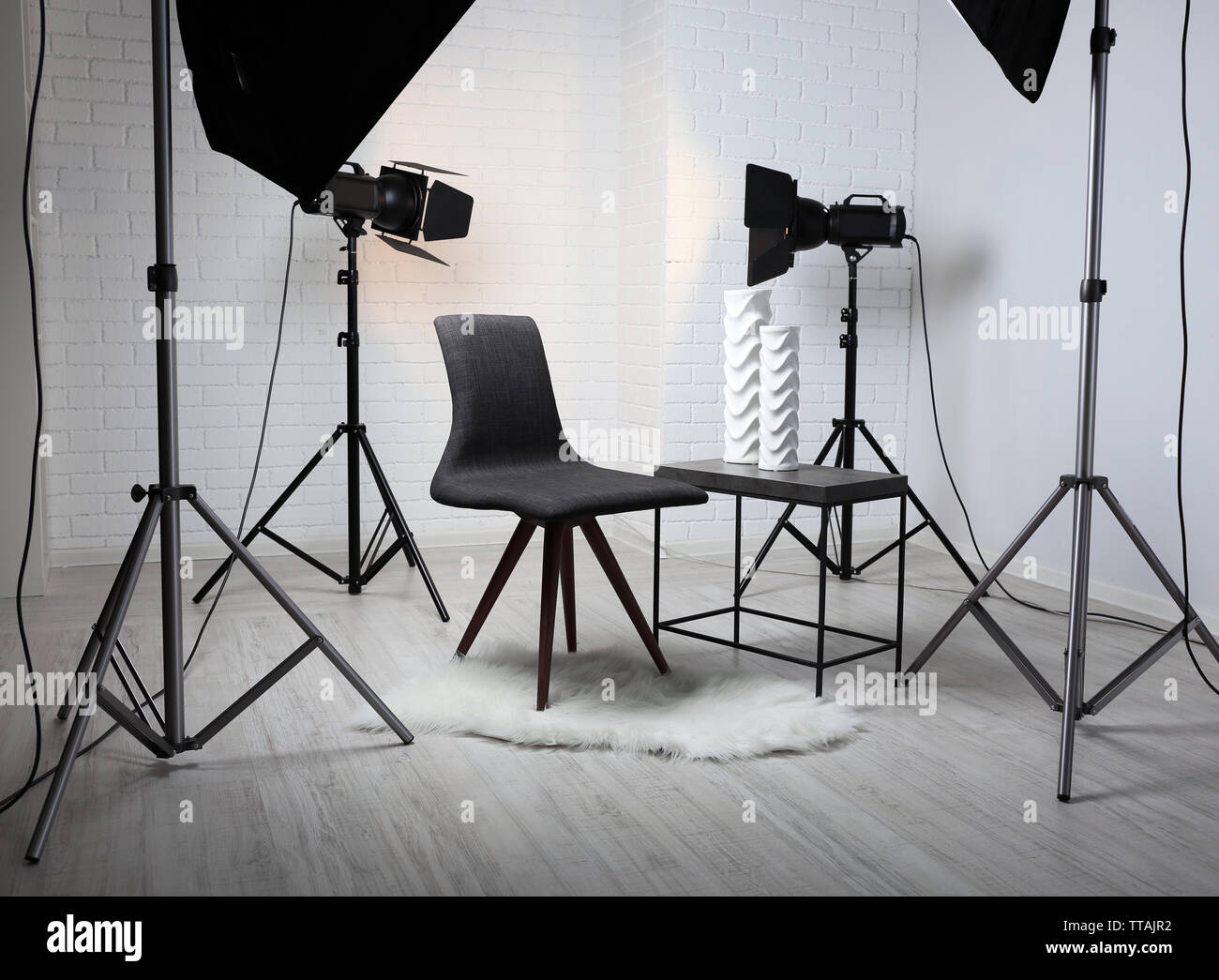 Photo studio with modern interior and lighting equipment Stock Photo ...