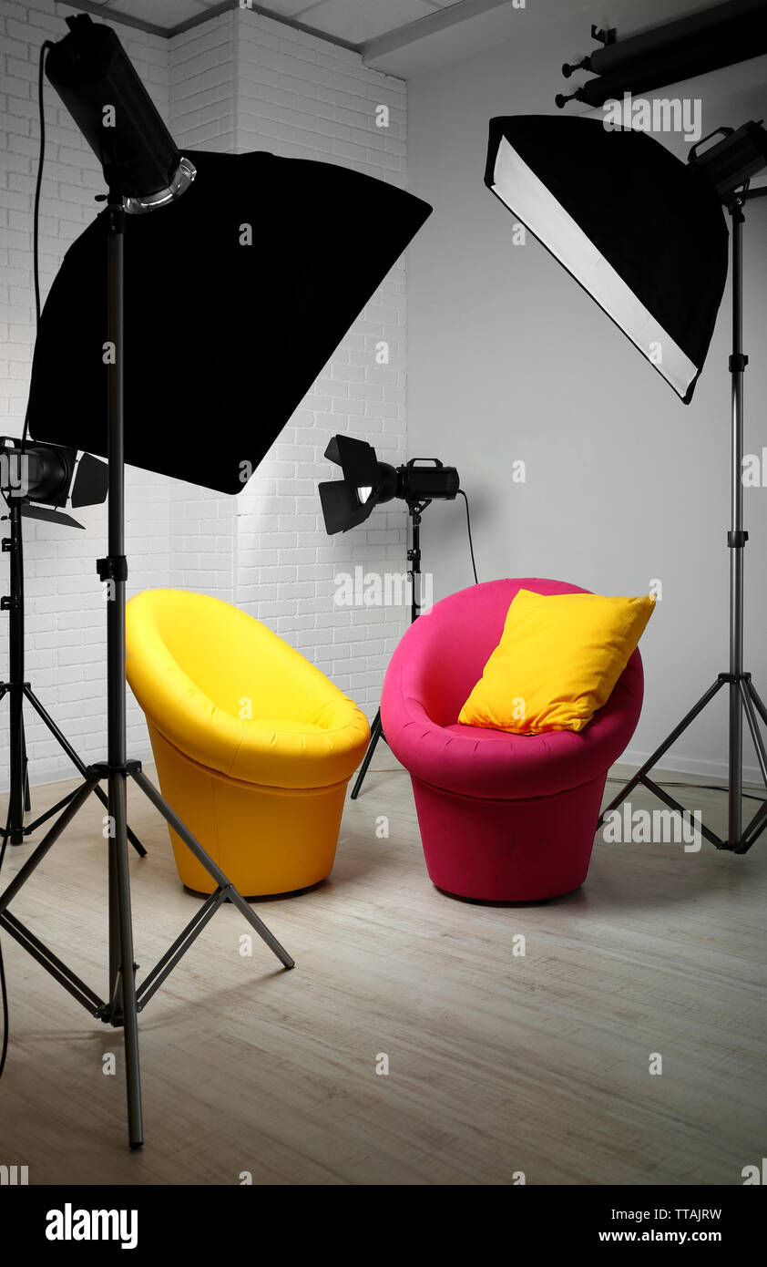 Photo studio with modern interior and lighting equipment Stock Photo ...
