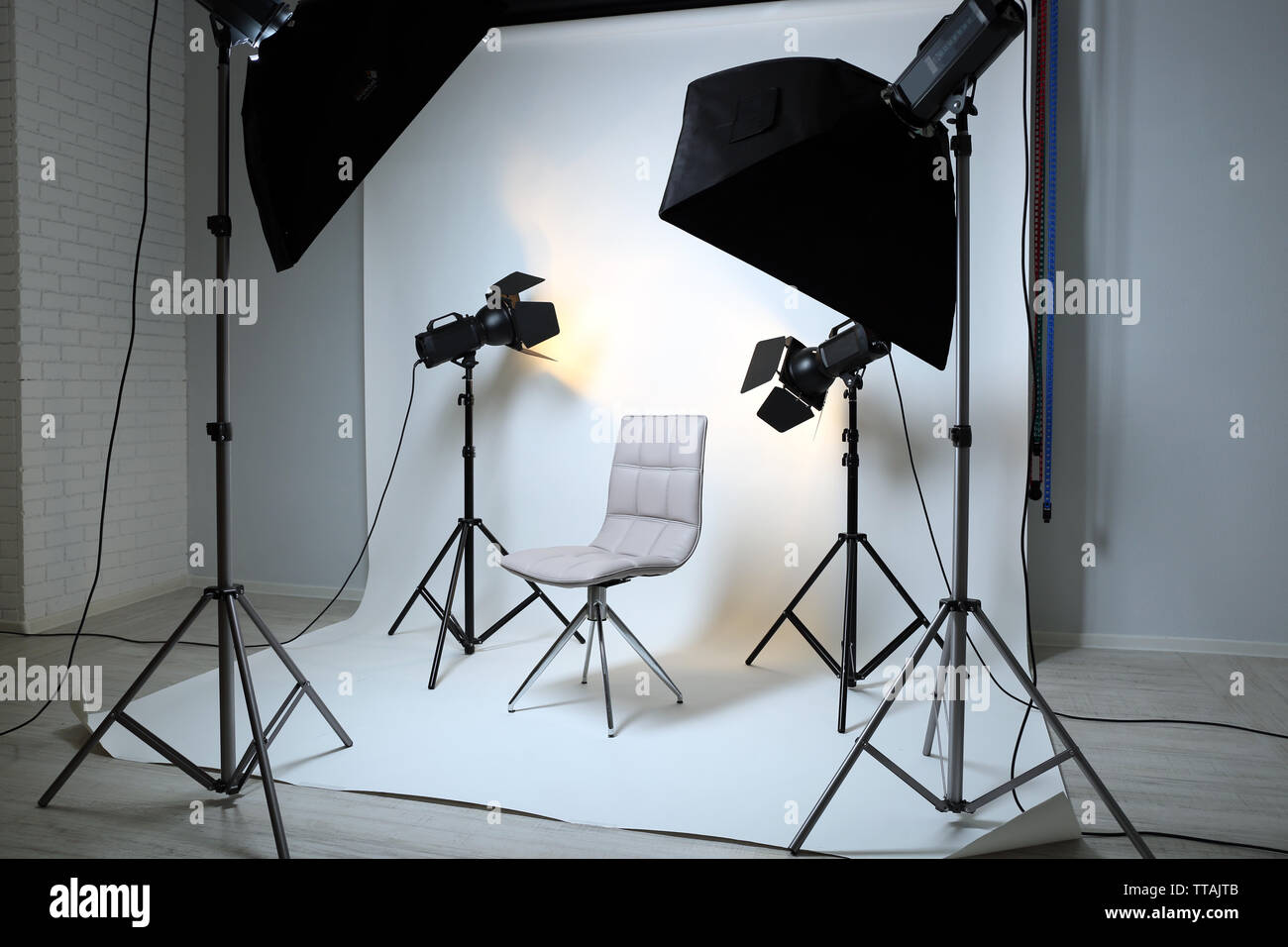 Photo studio with modern interior and lighting equipment Stock Photo ...