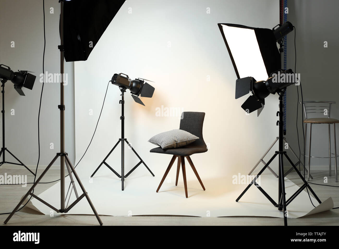 Photo studio with modern interior and lighting equipment Stock Photo ...