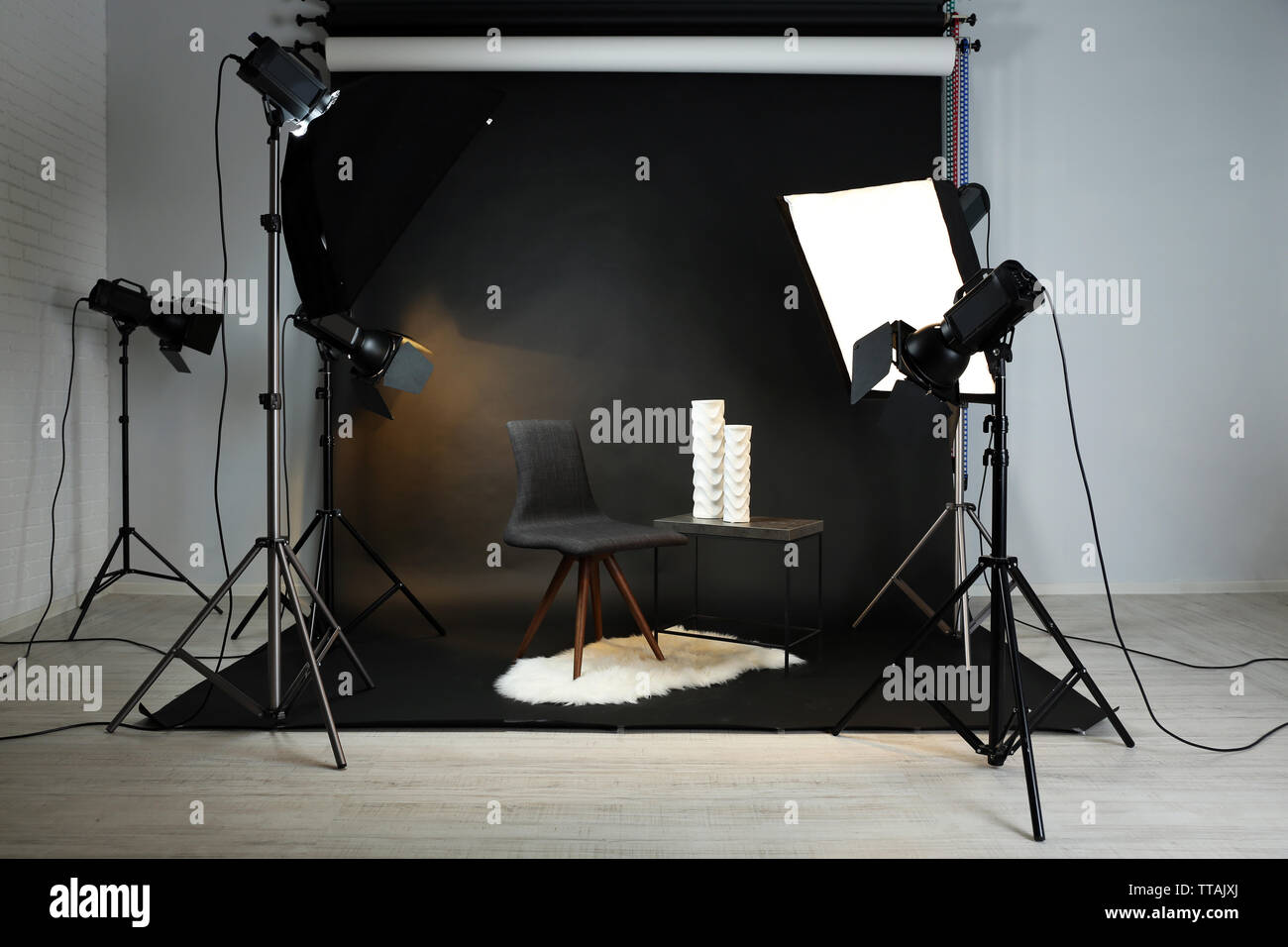 Photo studio with modern interior and lighting equipment Stock Photo ...