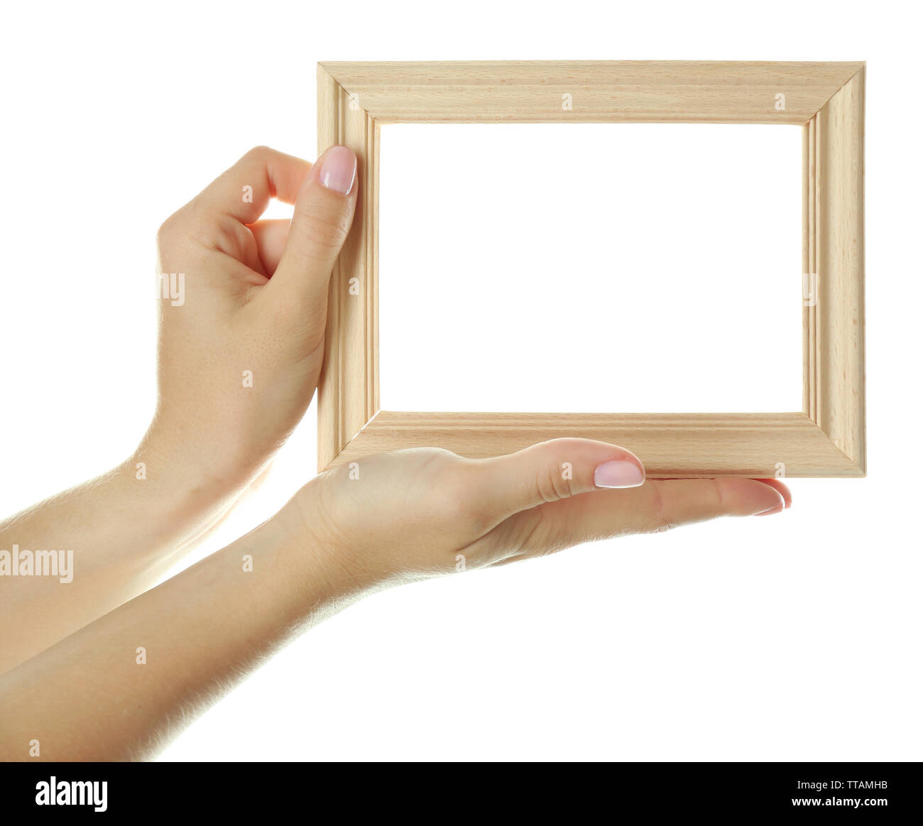 Female hands with wooden frame, isolated on white Stock Photo - Alamy