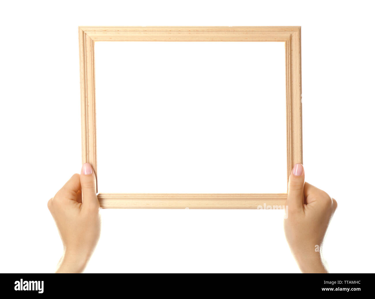 Female hands with wooden frame, isolated on white Stock Photo - Alamy