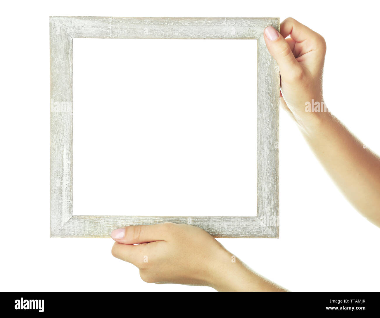 Female hands with wooden frame, isolated on white Stock Photo - Alamy