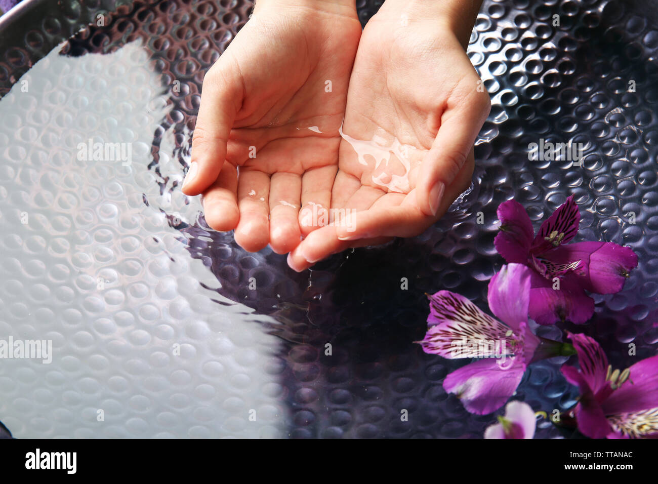 Female hands at spa manicure procedure Stock Photo - Alamy