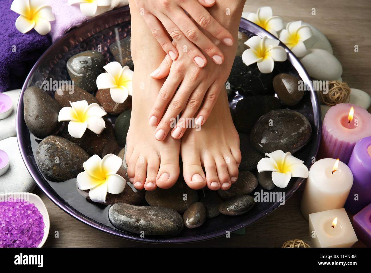 Female feet at spa pedicure procedure Stock Photo - Alamy