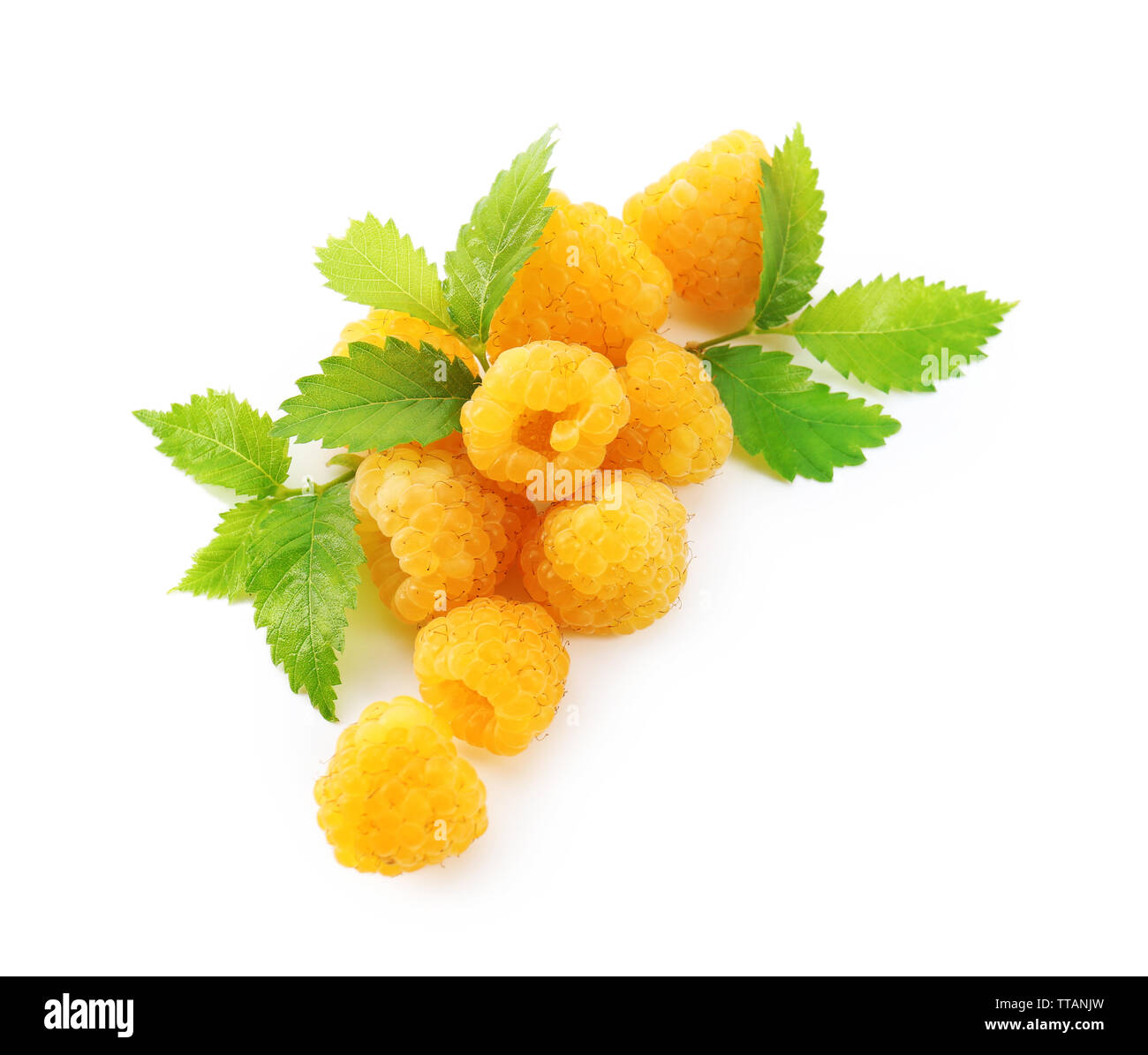 Yellow raspberries with green leaves isolated on white Stock Photo - Alamy