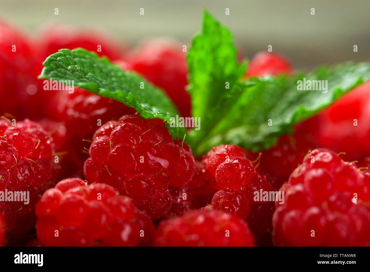 Sweet raspberries background Stock Photo - Alamy