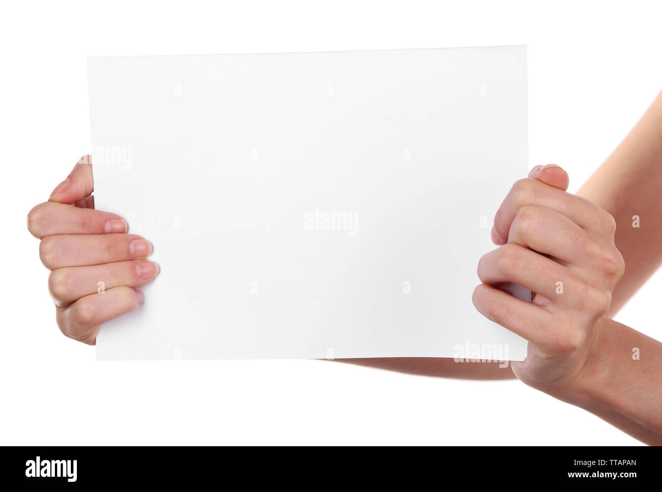 Female hands holding paper blank isolated on white Stock Photo - Alamy