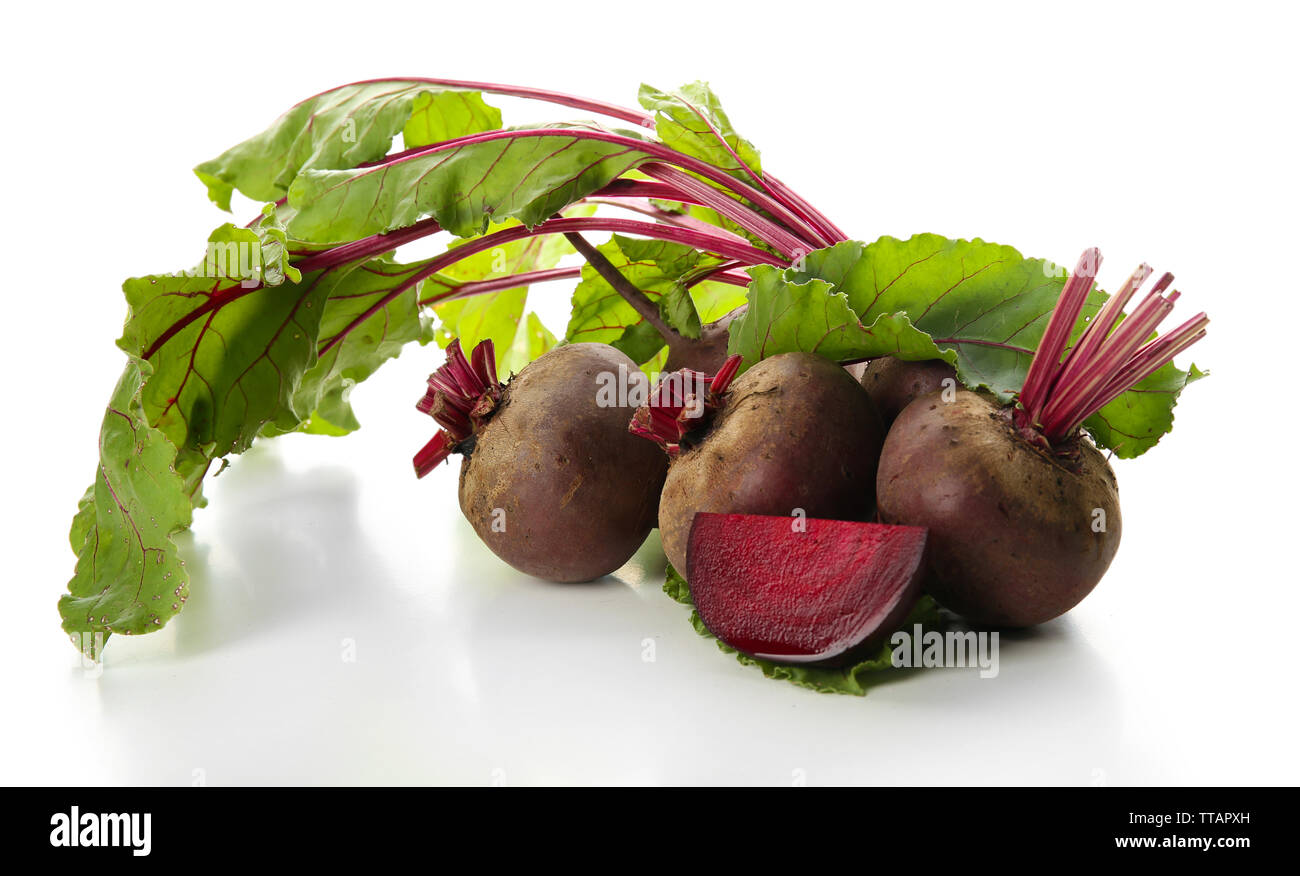 Young beets with leaves isolated on white Stock Photo - Alamy