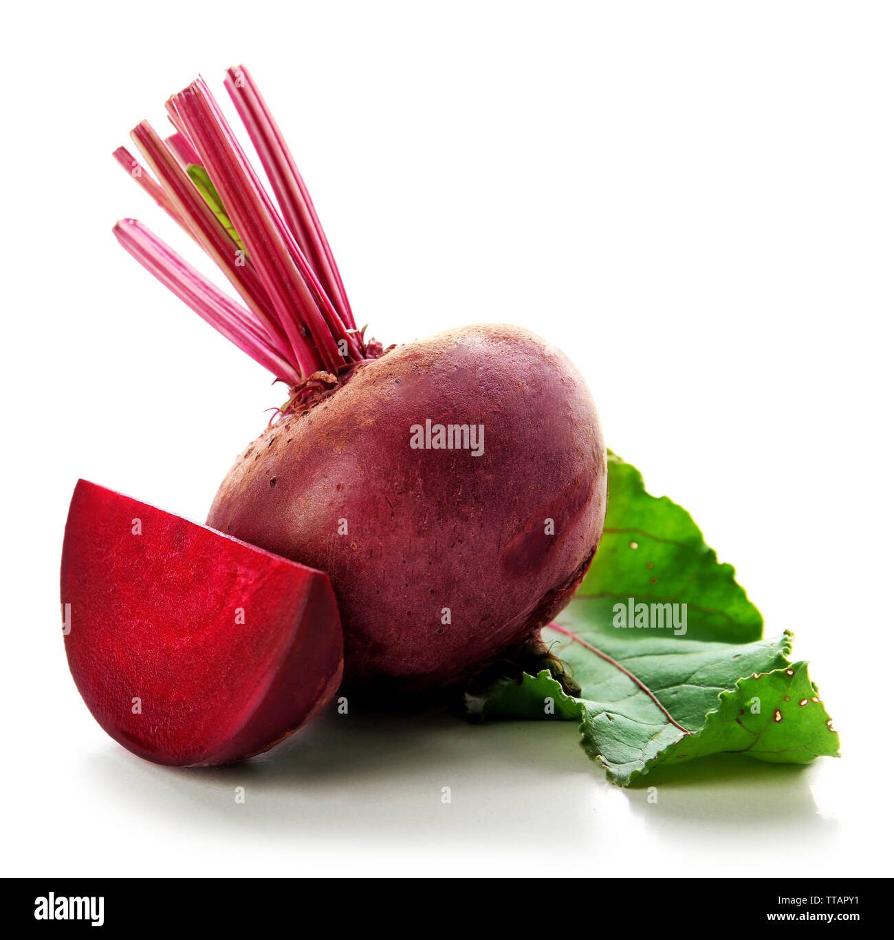 Young beets with leaf isolated on white Stock Photo - Alamy