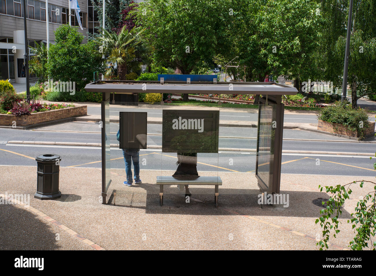 Bus stop in a city centre in France Stock Photo - Alamy