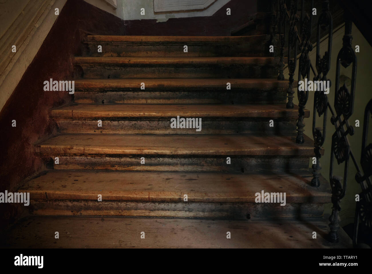 Retro style stairs with iron railing Stock Photo - Alamy